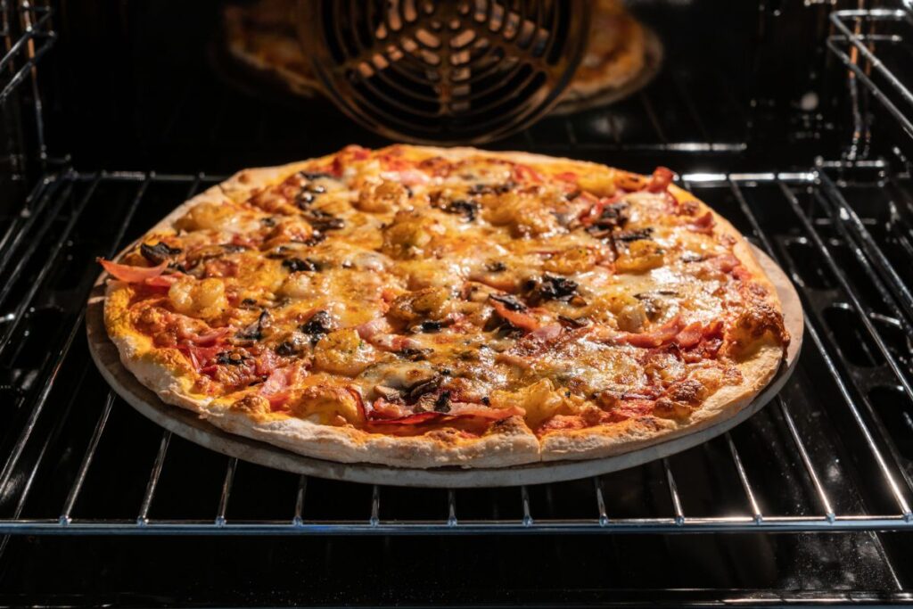 🥖 How Long Do You Cook Pizza In The Oven?